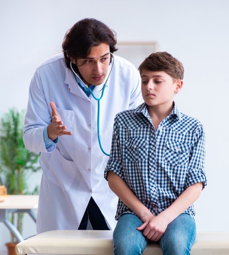 Male Doctor Examining Boy by Stethoscope Stock Photo - Image of medic ...