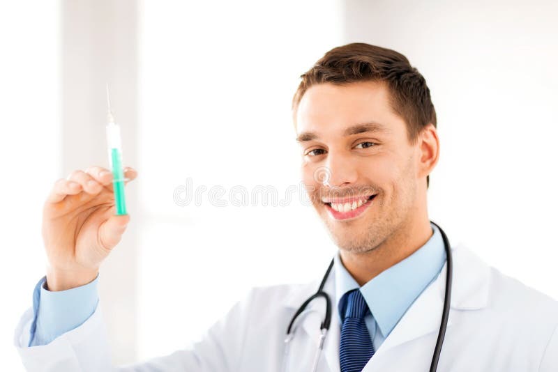 Male Doctor Holding Syringe with Injection Stock Photo - Image of local ...
