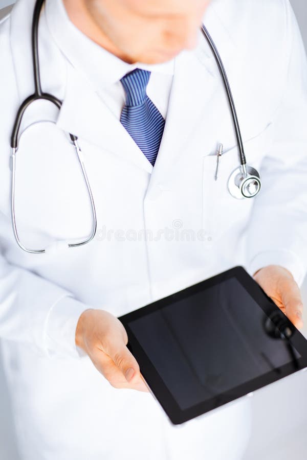 Male Doctor Holding Tablet Pc Stock Image - Image of care, medicine ...