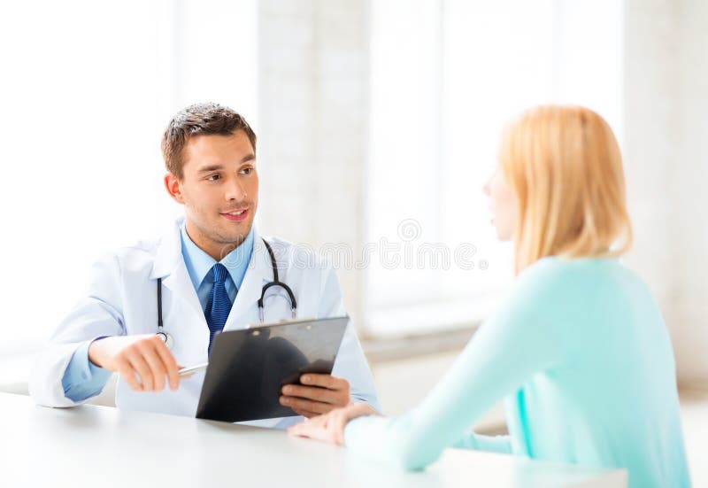 Male doctor with patient stock photo. Image of clinic - 32588622