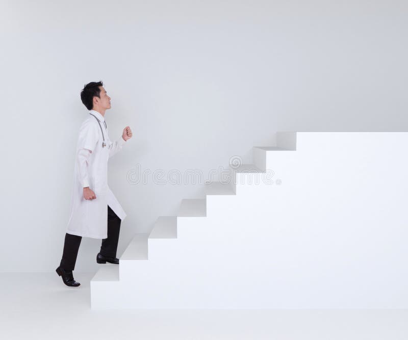 Male Doctor Stepping Up on Stairs Stock Photo - Image of people ...