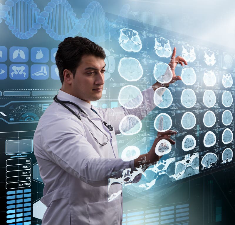 Male Doctor Studing X-ray Image of MRI Scan Stock Photo - Image of ...