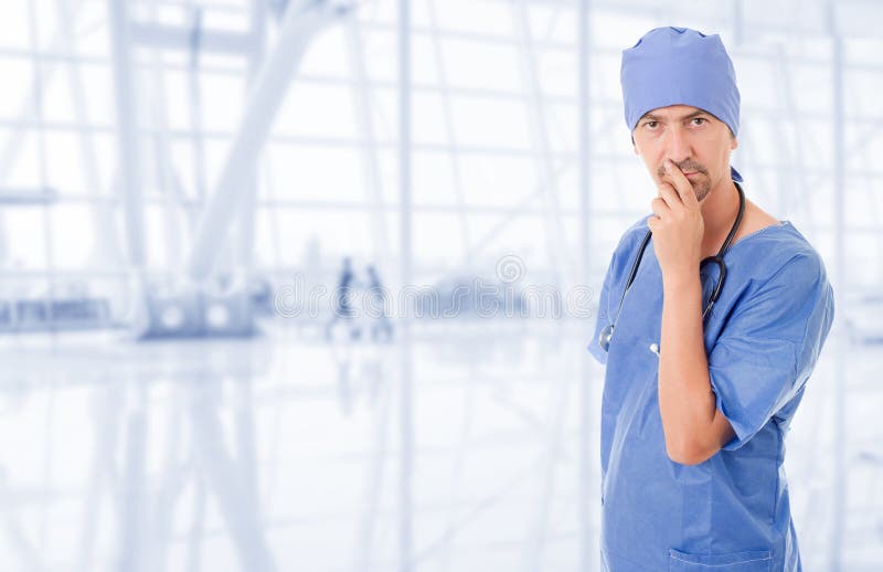 Doctor Thinking at the Hospital Stock Photo - Image of professional ...