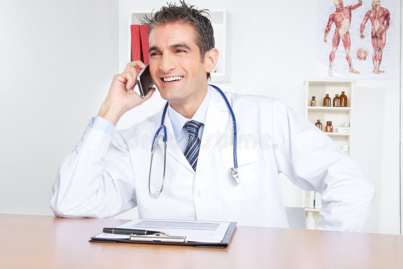 Male Doctor Using Mobile Phone Stock Image - Image of happy, physician ...
