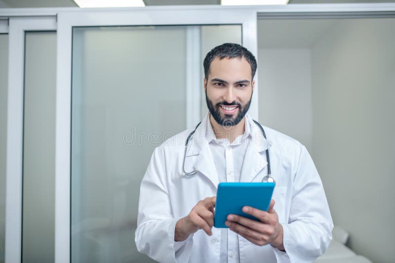 Male Doctor in a White Robe Feeling Good Stock Photo - Image of ...