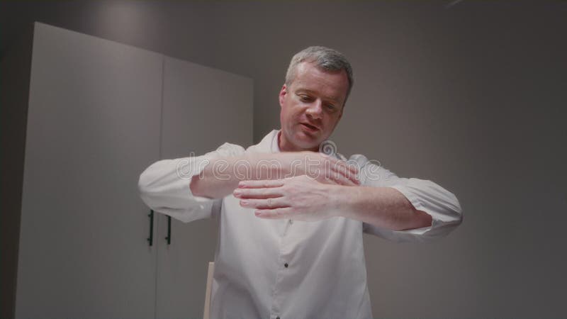 Male Doctor in Work Uniform Demonstrates Basic Knowledge in Practice at ...