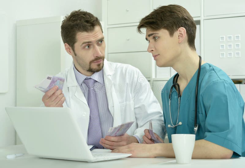Male Doctors in Medical Office Stock Photo - Image of practitioner ...