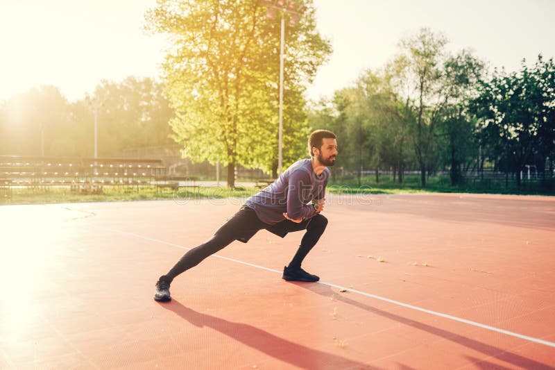 Male Doing Stretching Exercise, Preparing for Morning Workout in the ...