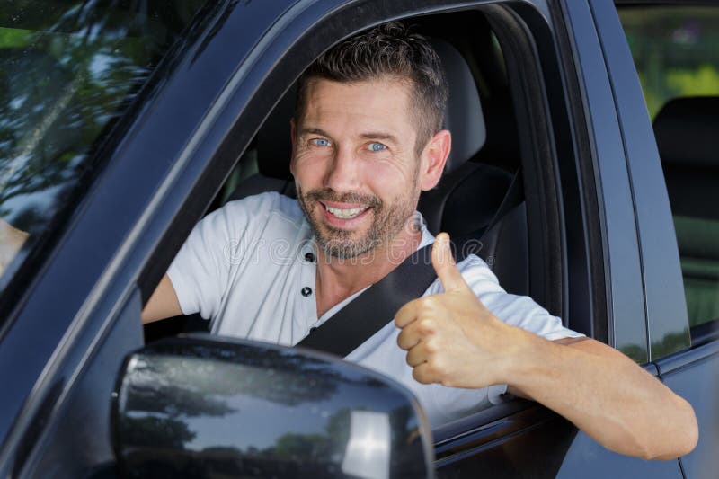 Male Driver Making Thumbs-up Gesture Stock Photo - Image of attractive ...