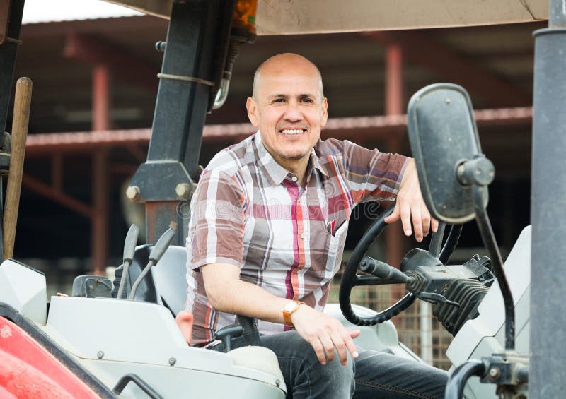 Male Driver Operating Modern Tractor Stock Photos - Free & Royalty-Free ...