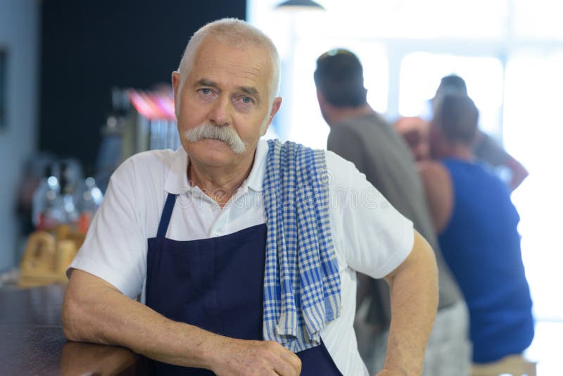 Male Elderly Bar Keeper Posing Stock Image - Image of apron, happy ...
