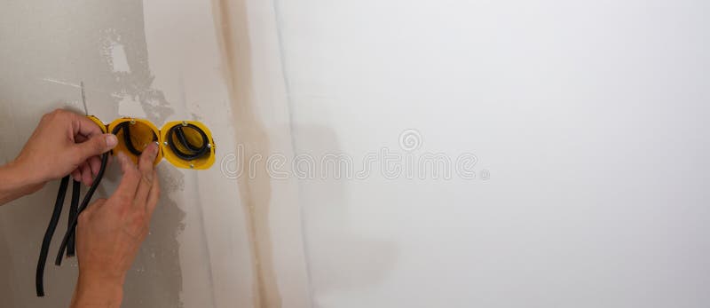 Male Electrician Installing Socket. Selective Focus Stock Image - Image ...