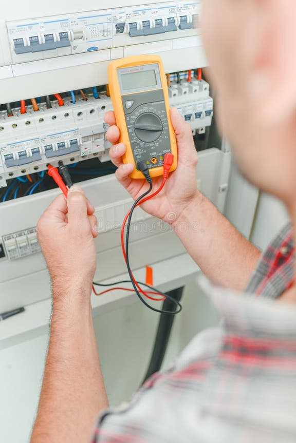 Male Electrician Using Device Stock Photo - Image of test, circuit ...