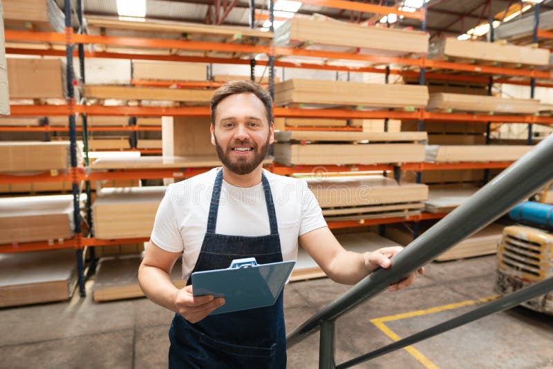 Employee Climbing Stairs and Looking at Camera at Warehouse Stock Image ...