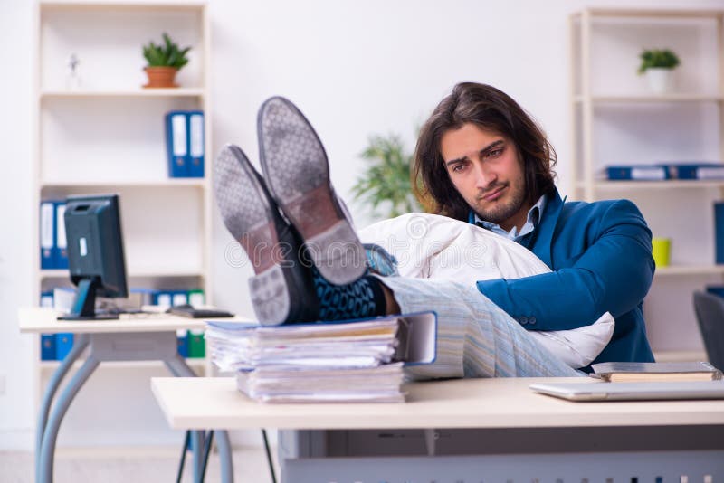 Male Employee Coming To Work Straight from Bed Stock Image - Image of ...