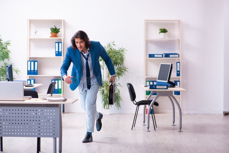 Male Employee Coming To Work Straight from Bed Stock Image - Image of ...