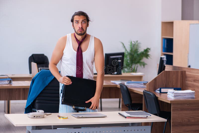 Young Male Employee Coming To Work Straight from Bed Stock Image ...