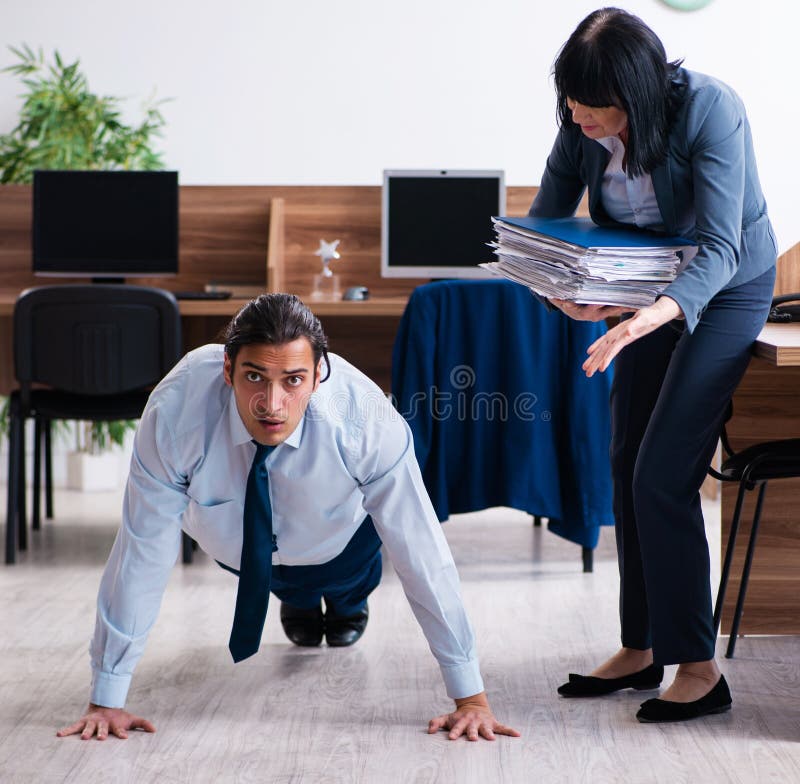 Male Employee Doing Sport Exercises in the Office Stock Photo - Image ...