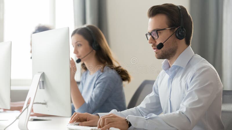 Male Employee in Headset with Microphone Work on Pc Stock Image - Image ...
