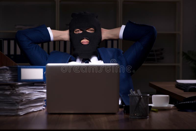 Male Employee Stealing Information in the Office Night Time Stock Photo ...