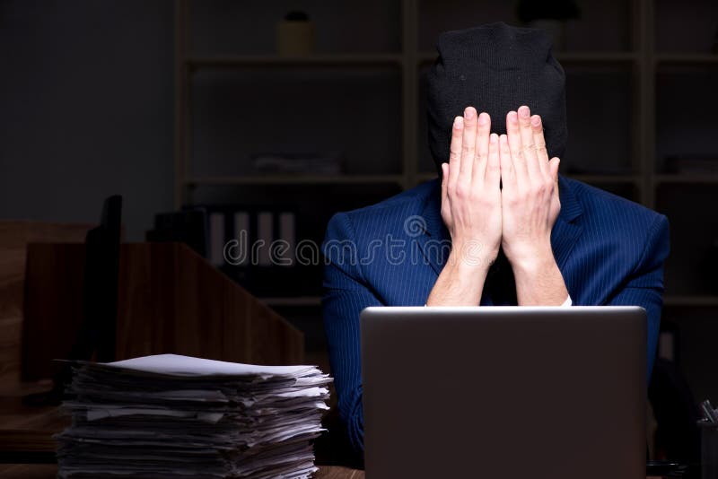 Male Employee Stealing Information in the Office Night Time Stock Photo ...