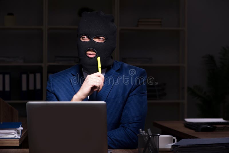 Male Employee Stealing Information in the Office Night Time Stock Photo ...
