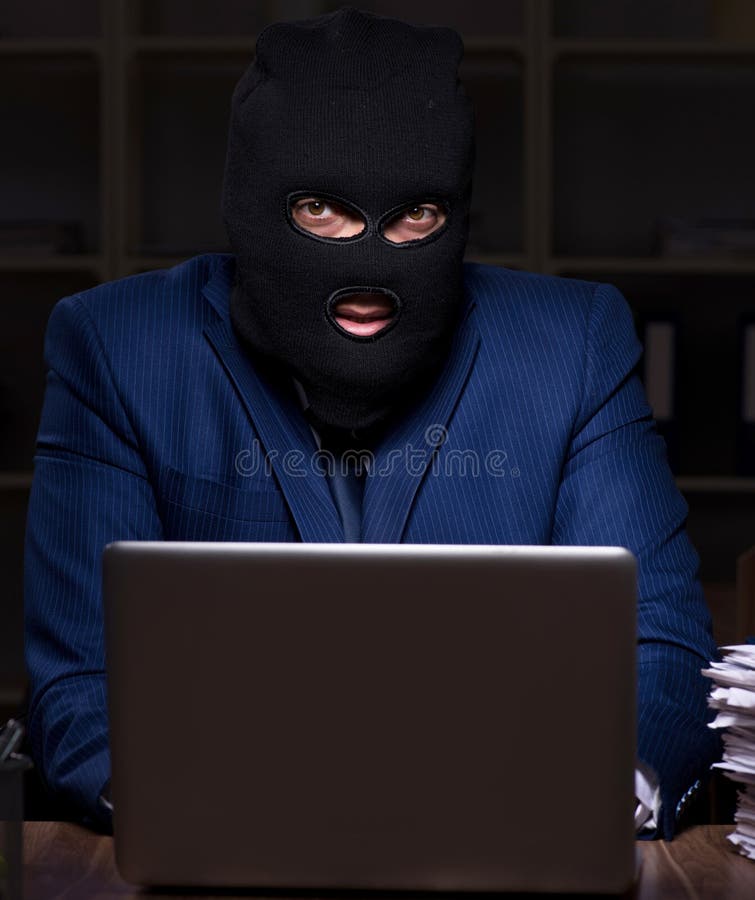 Male Employee Stealing Information in the Office Night Time Stock Photo ...