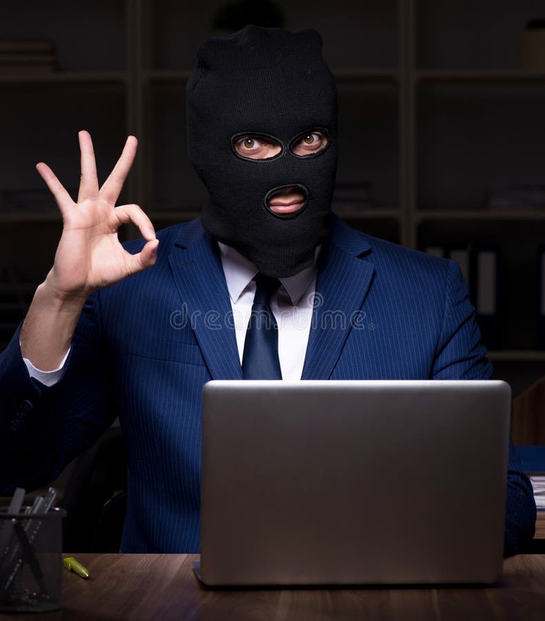 Male Employee Stealing Information in the Office Night Time Stock Photo ...