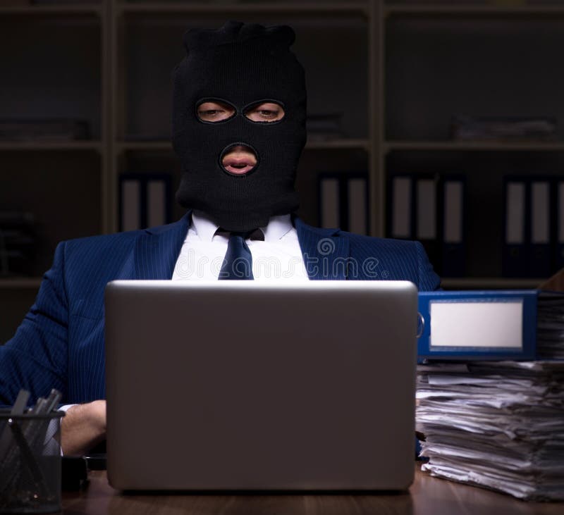 Male Employee Stealing Information in the Office Night Time Stock Photo ...