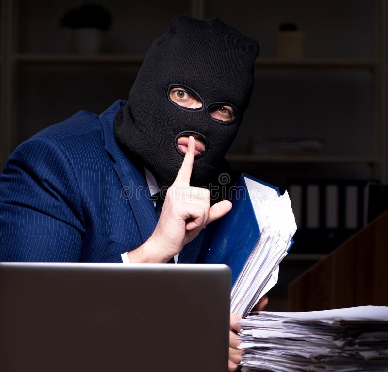 Male Employee Stealing Information in the Office Night Time Stock Photo ...