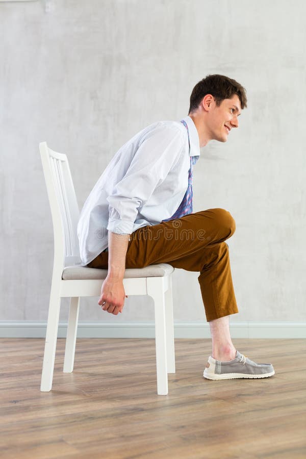 Male Employee Stretching at Office Chair at Work, Tired Office Worker ...