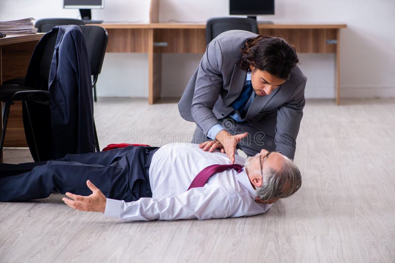 Male Employee Suffering from Heart Attack in the Office Stock Image ...