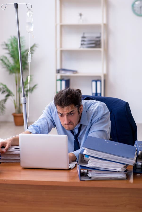 Young Male Employee Suffering at Workplace Stock Image - Image of ...