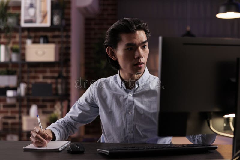 Male Employee Taking Notes on Files Stock Image - Image of adult ...