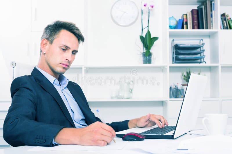 Male Employee Taking Notes on Paper Stock Image - Image of occupation ...