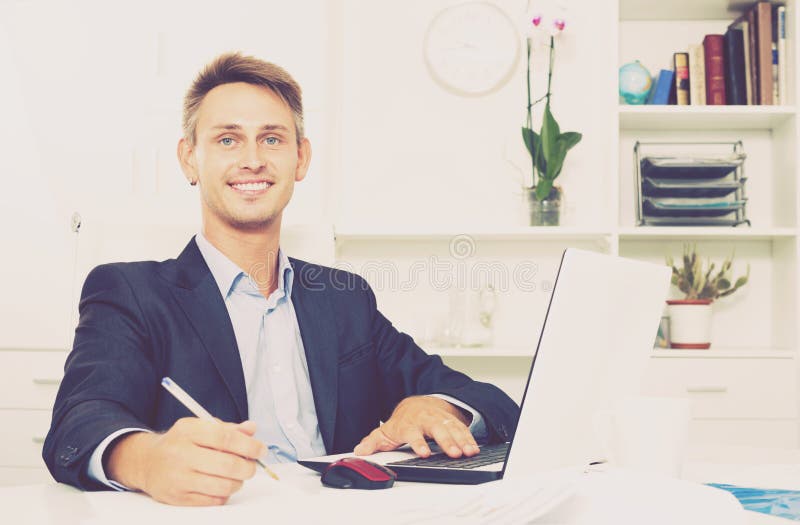 Male Employee Taking Notes on Paper Stock Photo - Image of planning ...