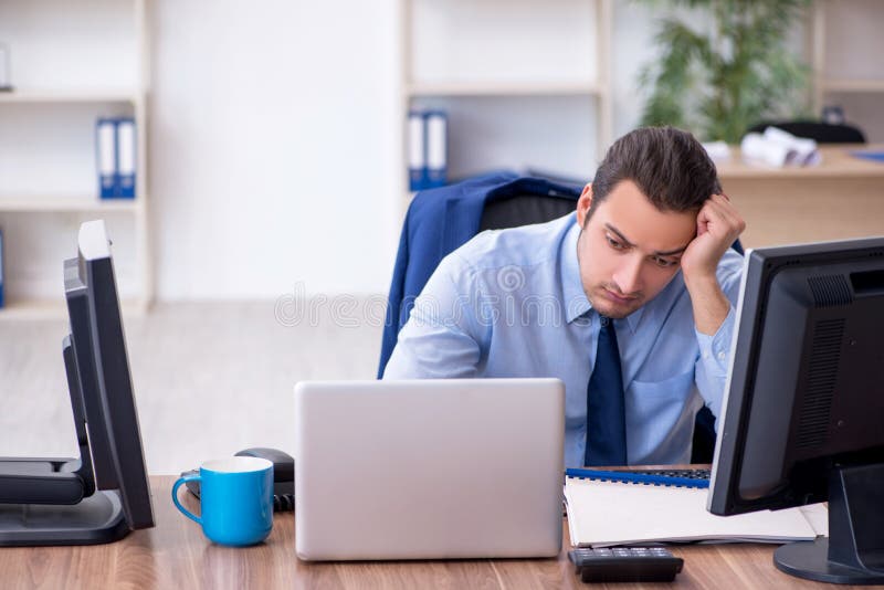 Young Male Employee Unhappy with Excessive Work Stock Image - Image of ...