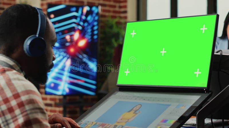 Male Employee Working with Greenscreen and Retouching Software Stock ...