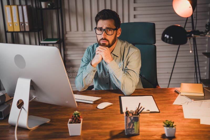 Male Employee Working at Modern Office Space, Reviewing Ideas while ...