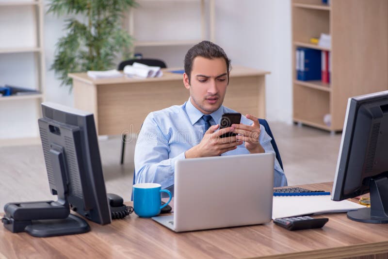 Young Male Employee Working in the Office Stock Photo - Image of screen ...