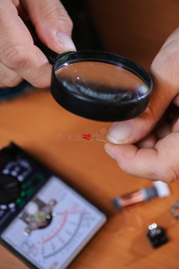 Male Engineer Checking Diode with Magnifier Stock Image - Image of ...