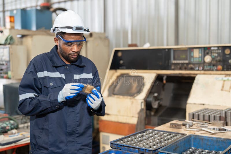 Male Engineer Checking Part of Workpiece in Production at Metal Factory ...