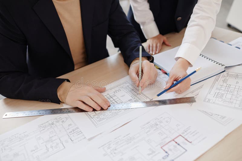 Male Engineer Drawing Blueprints and Plans by Hand at Table Stock Image ...