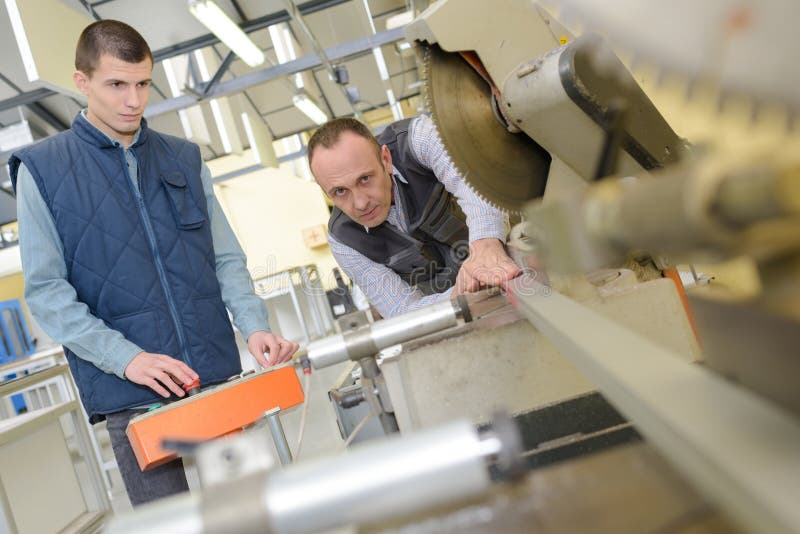 Male Engineer in Factory Using Machine Stock Image - Image of ...
