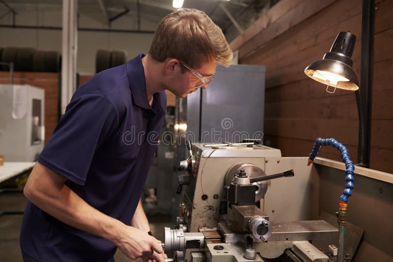 Male Engineer in Factory Using Milling Machine Stock Photo - Image of ...