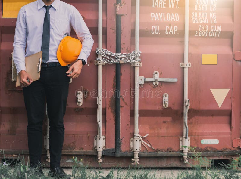 Male Engineer Inspection Checking on Container Background with Note on ...