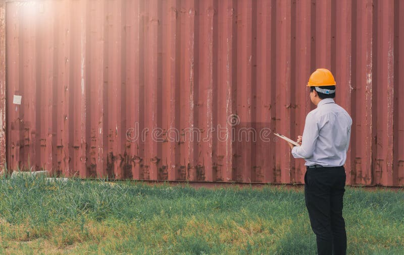 Male Engineer Inspection Checking on Container Background with Note on ...