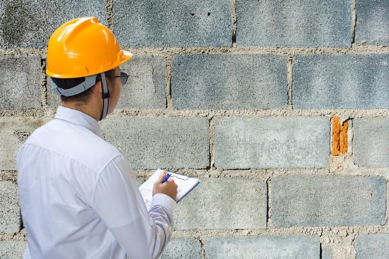Male Engineer Inspection Checking in Factory with Note on Notepad or ...