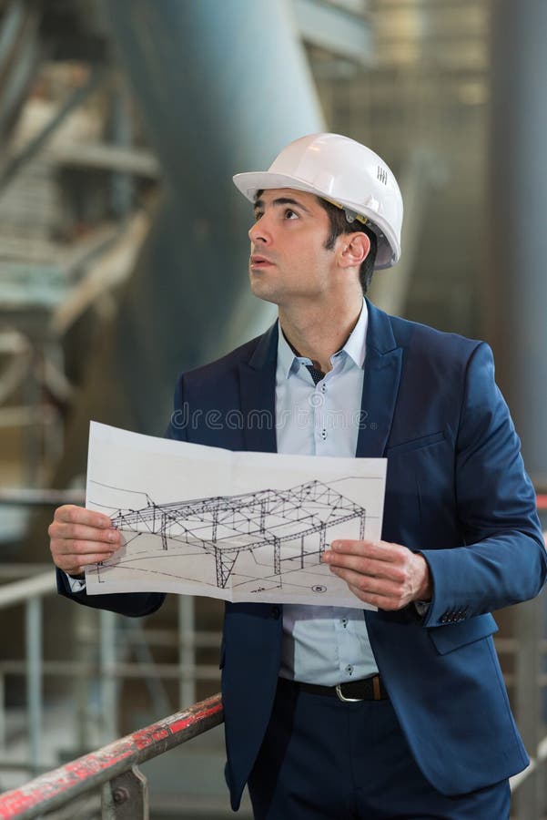 Male Engineer Looking at Plan Stock Image - Image of stand, leader ...