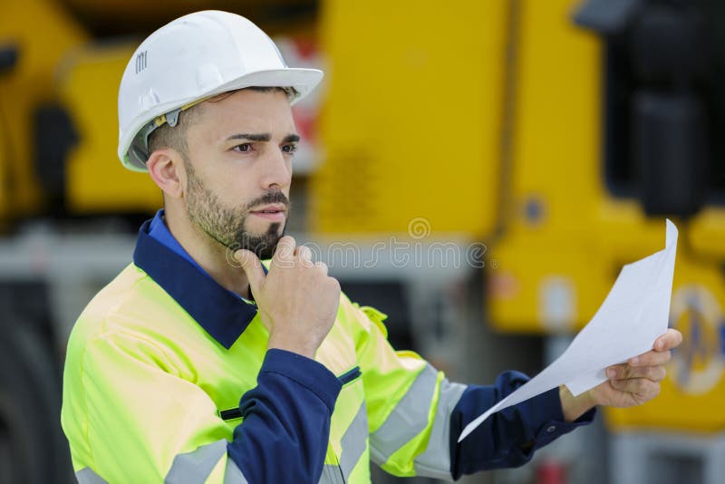 Male Engineer Outside Construction Site Stock Photo - Image of plan ...